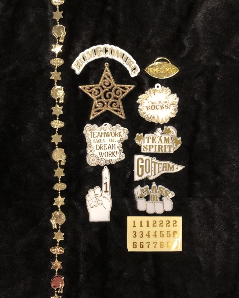 GOLD MET. GARLAND & EMBLEM SET CONSIST OF 1 YARD OF GARLAND & 9 MOST ...